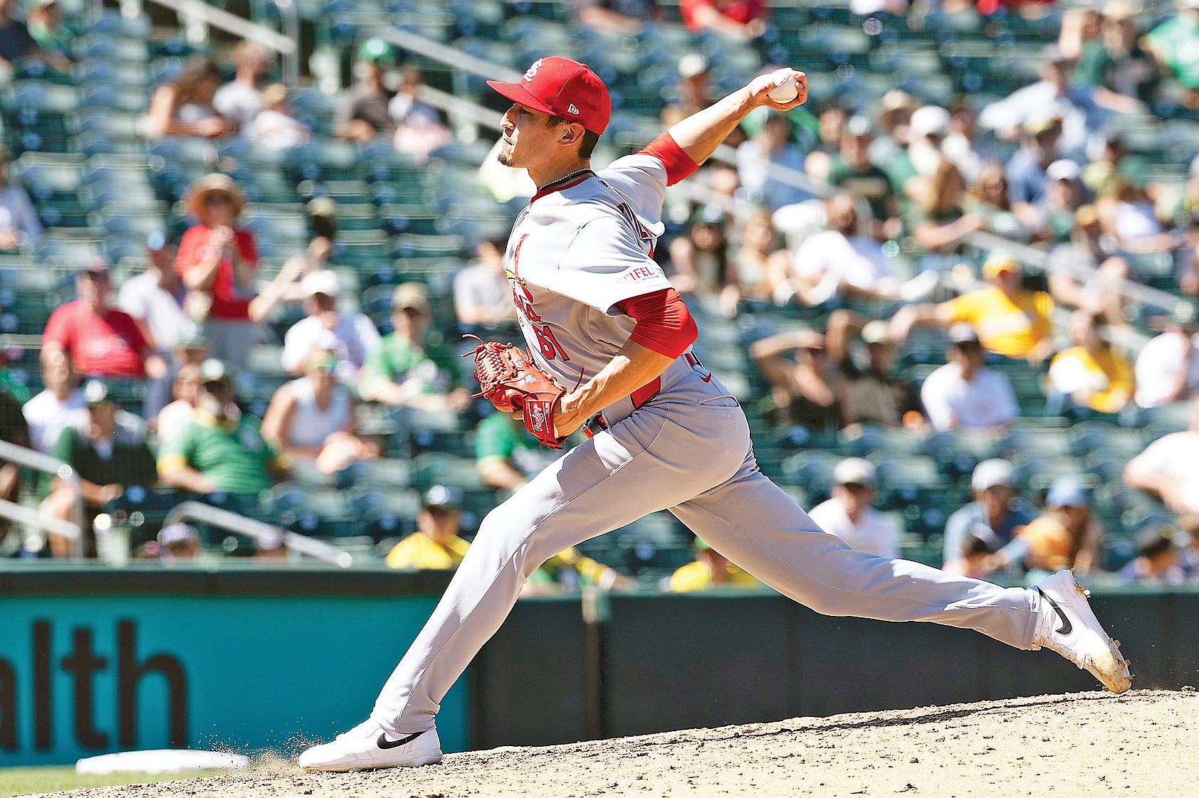 Down to last strike, Cardinals score twice in ninth to stun Athletics ...